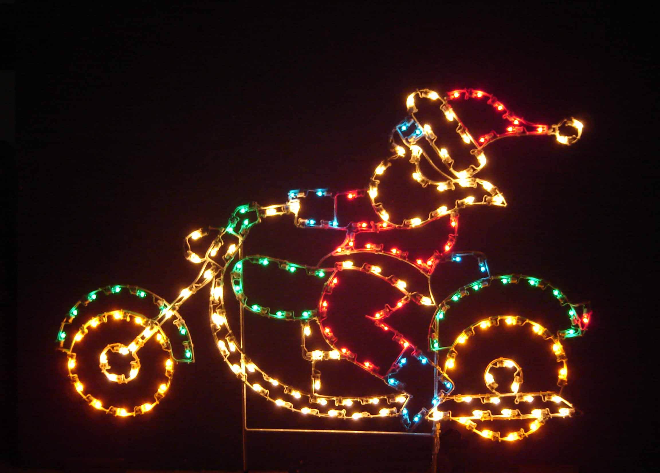 SANTA RIDING MOTORCYCLE - Creative Displays